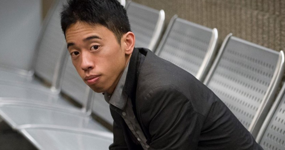 Le journaliste Michaël Nguyen tente de récupérer son ordinateur saisi